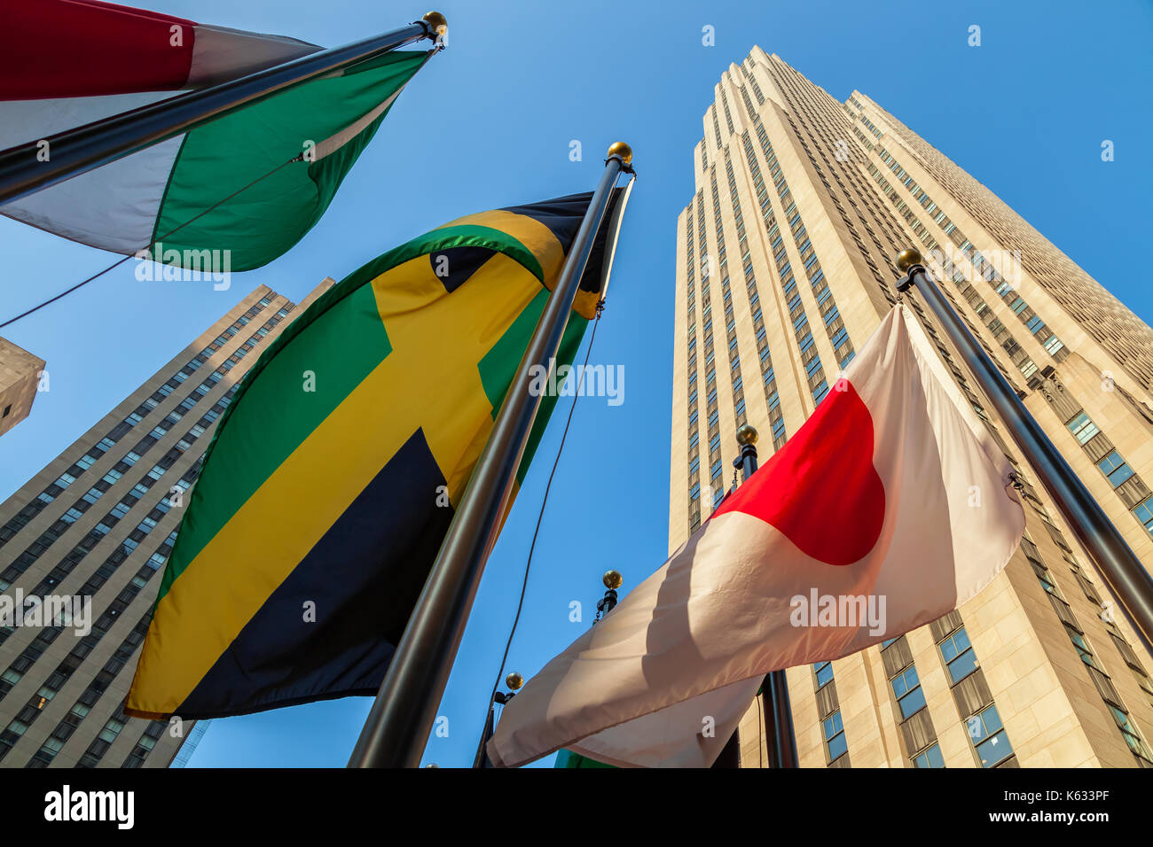 Flags of the world nations fly at the Rockefeller Center with the ...