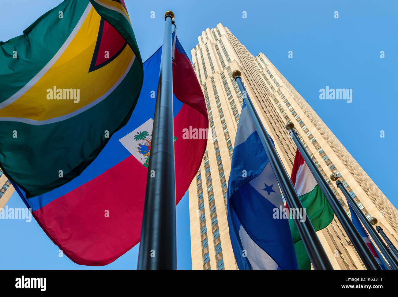 Flags of the world nations fly at the Rockefeller Center with the ...
