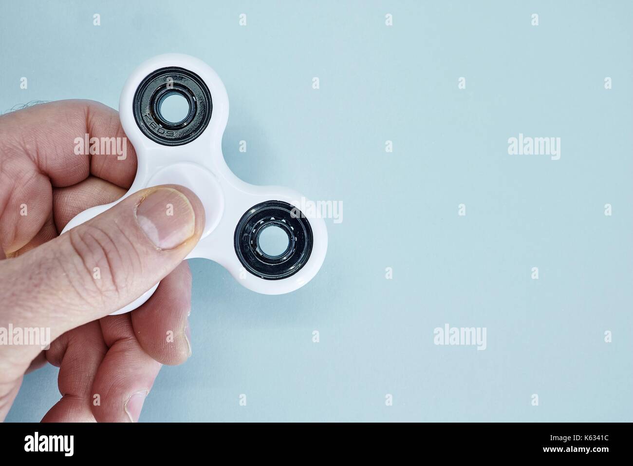 A studio photo of a finger spinner Stock Photo - Alamy