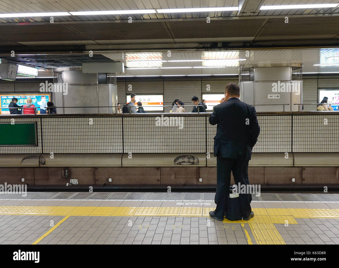 Tokyo, Japan - Nov 24, 2016. A man waiting at the metro station in ...