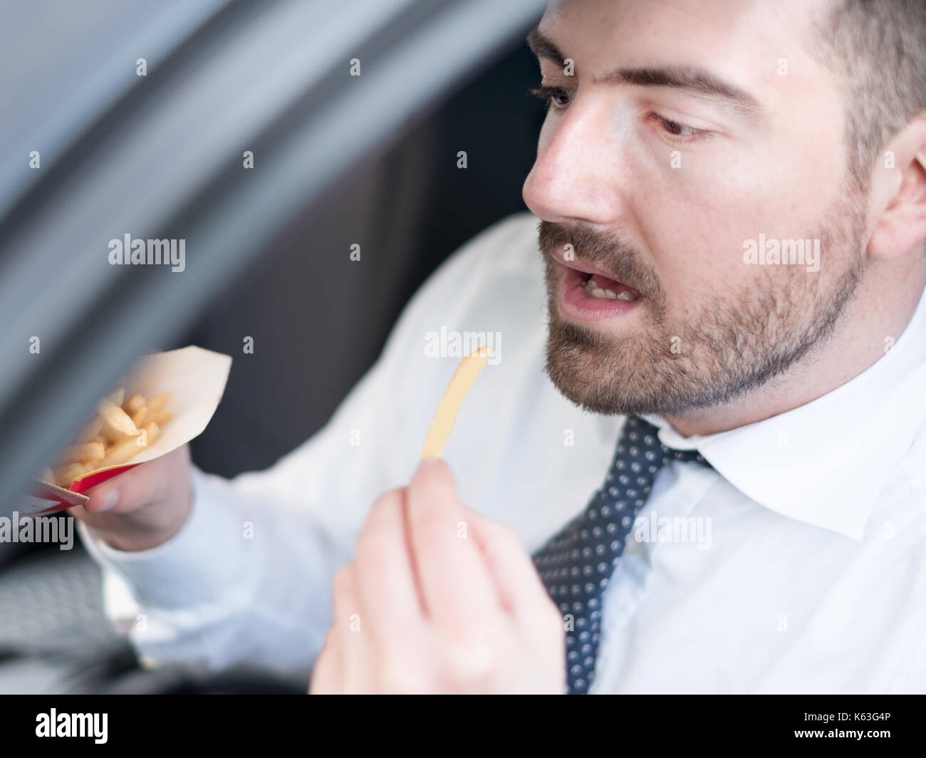 Junk food in car hi-res stock photography and images - Alamy
