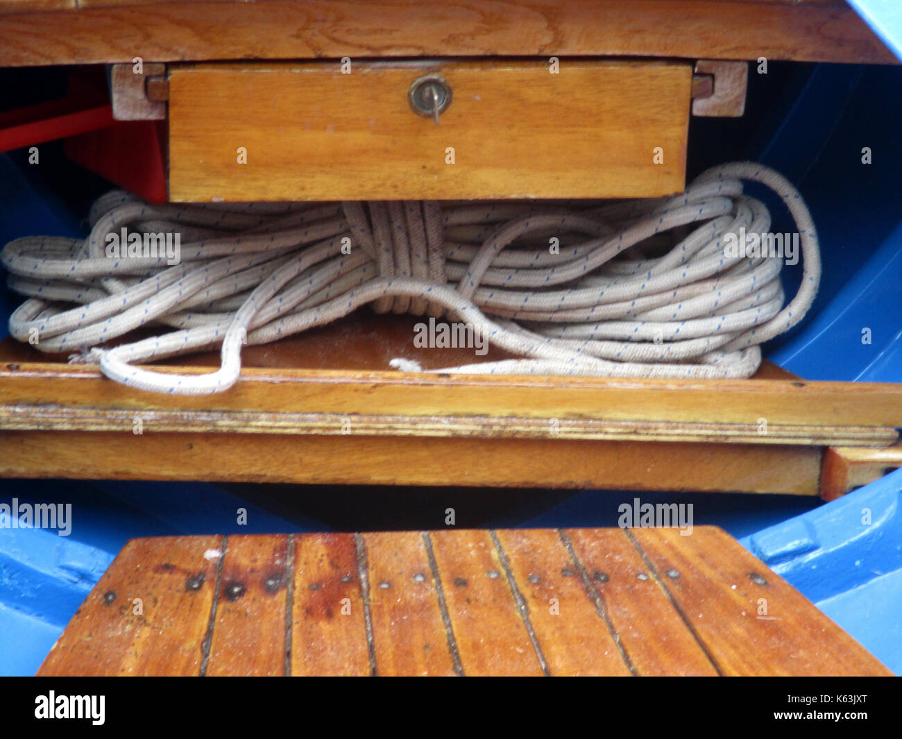 rolled fishing ropes on a boat Stock Photo - Alamy