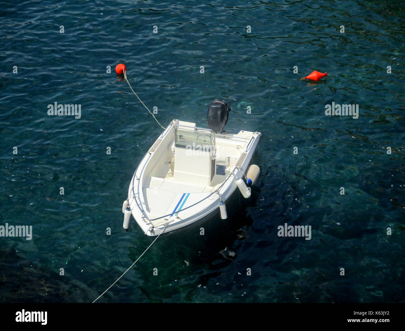 Boat anchored in water hi-res stock photography and images - Alamy