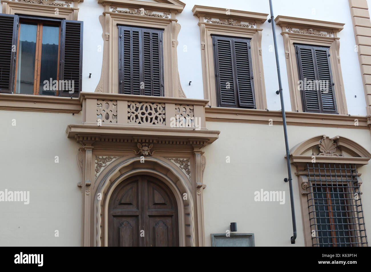 Ornate architectural design of a building exterior. Florence, Italy ...