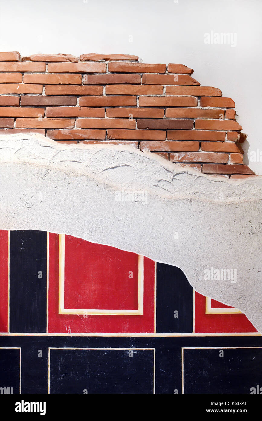 Construction concept showing the layers in a wall with red bricks ...