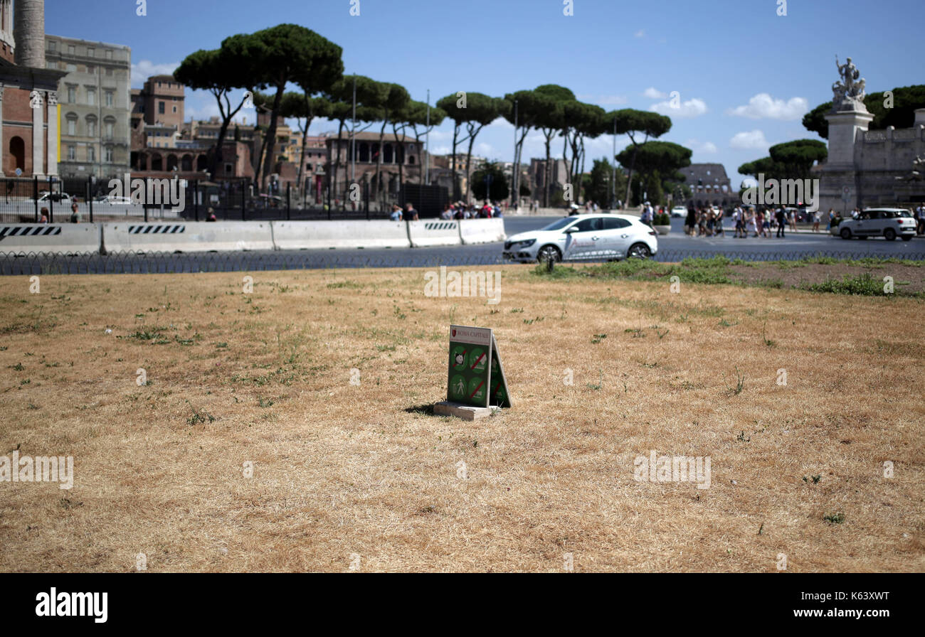 Dry flower beds in Piazza Venezia in Rome, Italy, as southern Europe is ...