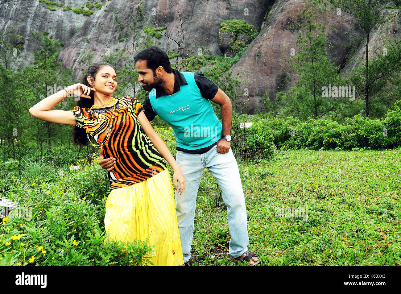 Young couple having fun at outdoors, actor acting at shooting movie ...