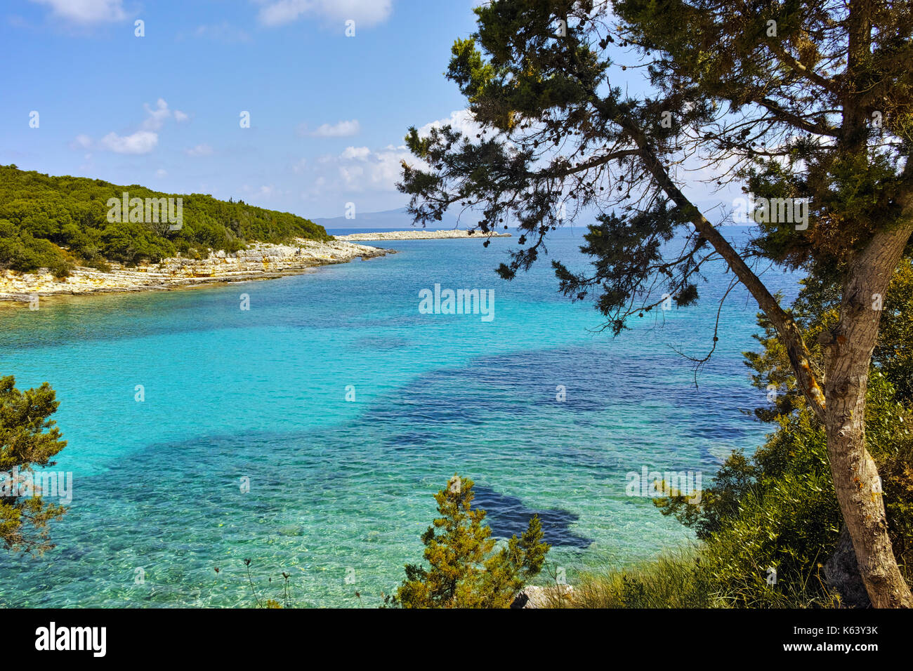 Blue waters of Emblisi Fiskardo Beach, Kefalonia, Ionian islands ...