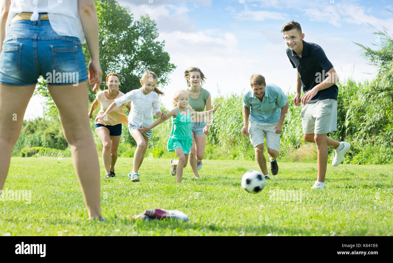 Boy running after soccer ball hi-res stock photography and images - Alamy