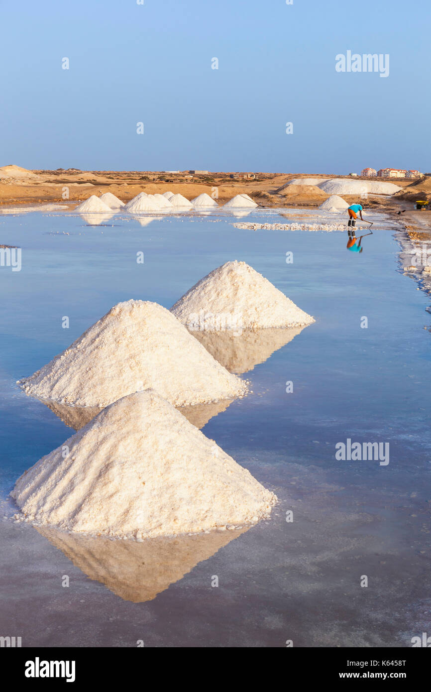CAPE VERDE SAL Piles of salt collected from natural salt pans at ...