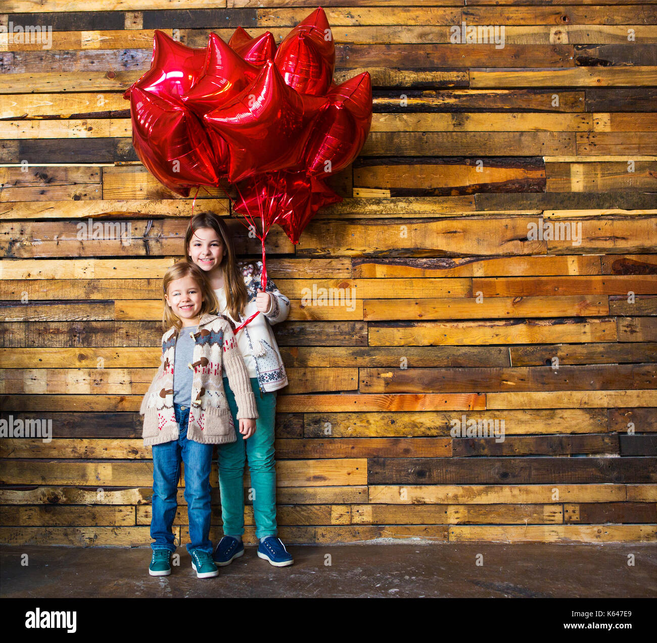 Children with balloons hi-res stock photography and images - Alamy