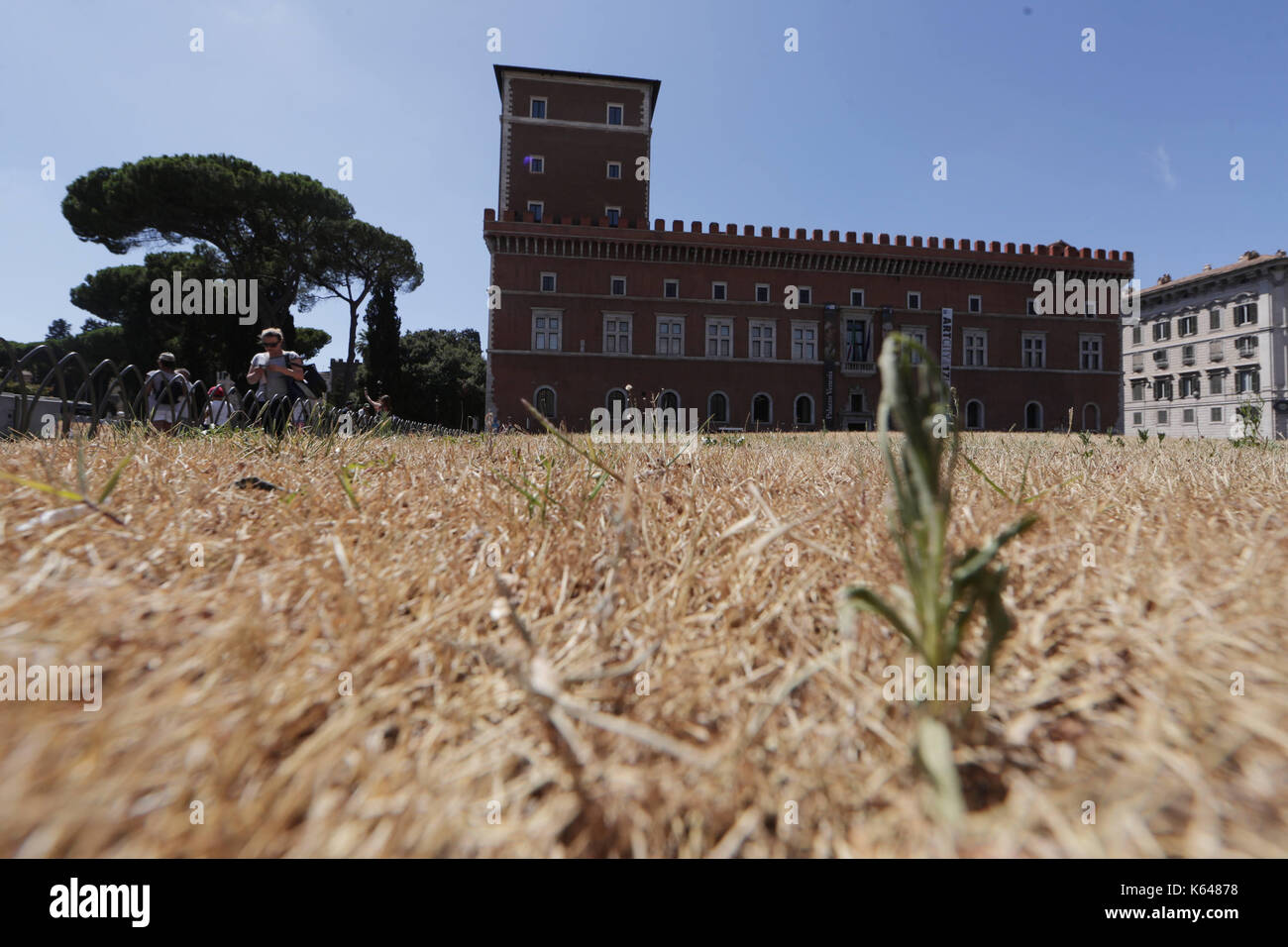 Dry flower beds in Piazza Venezia in Rome, Italy, as southern Europe is ...