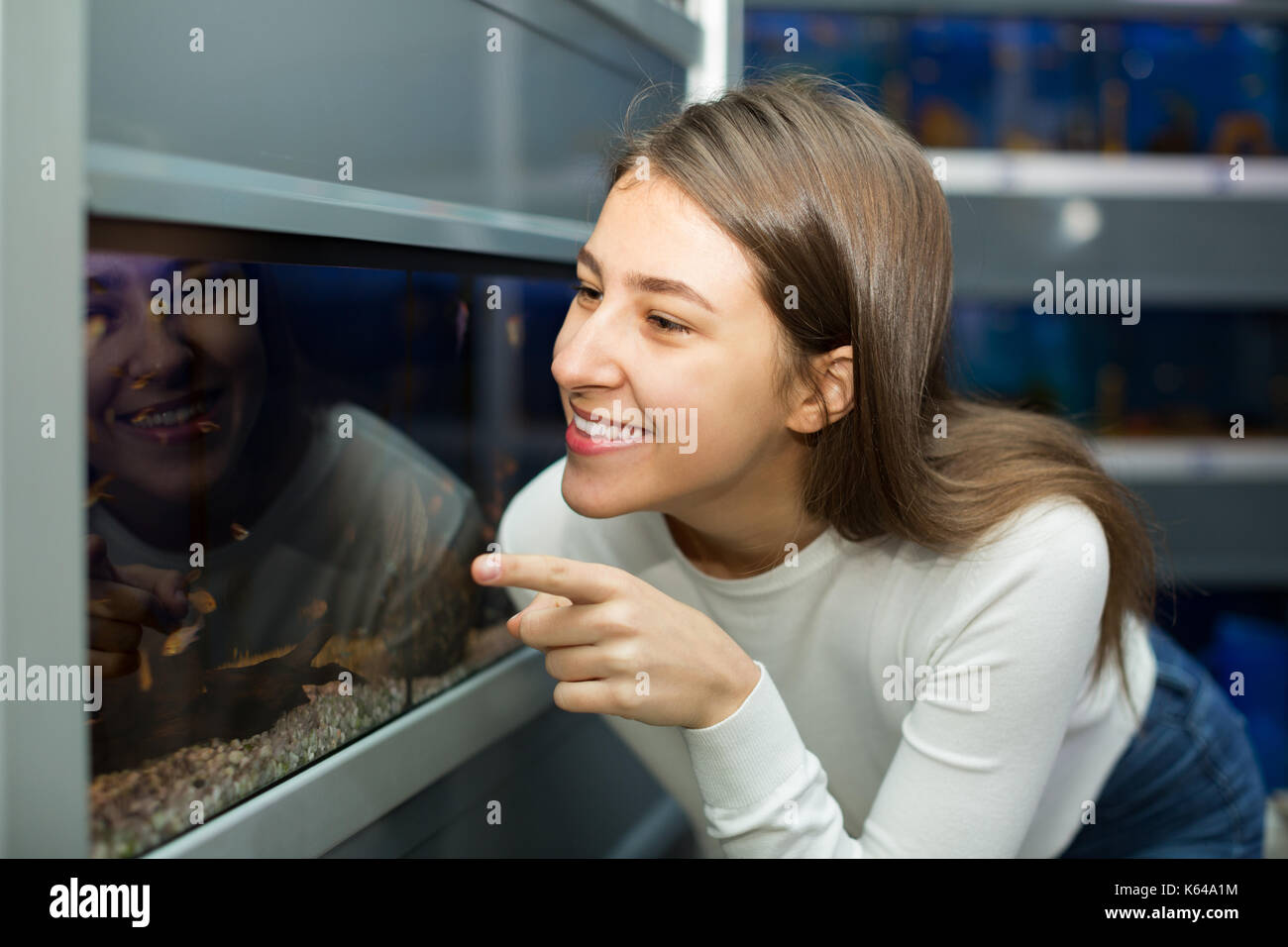 Girl watching pet fish hi-res stock photography and images - Alamy