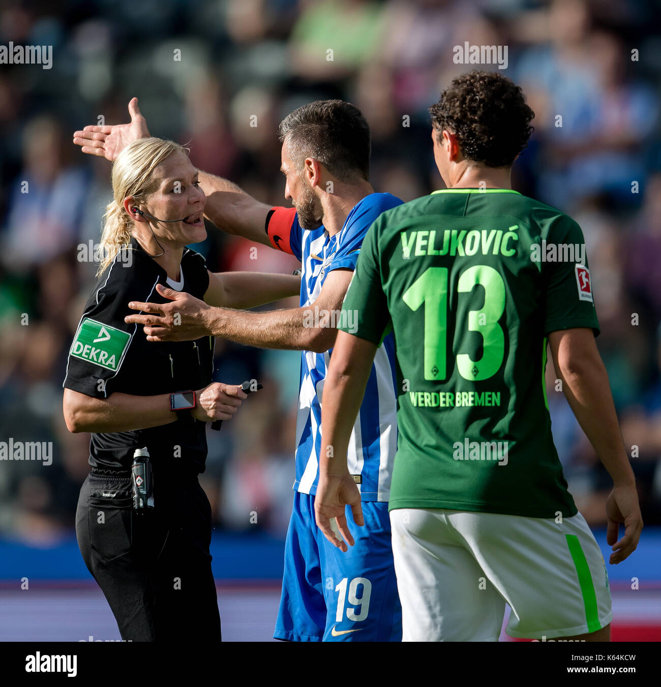 Berlin, Germany. 10th Sep, 2017. Referee Bibiana Steinhaus (L) talks to ...