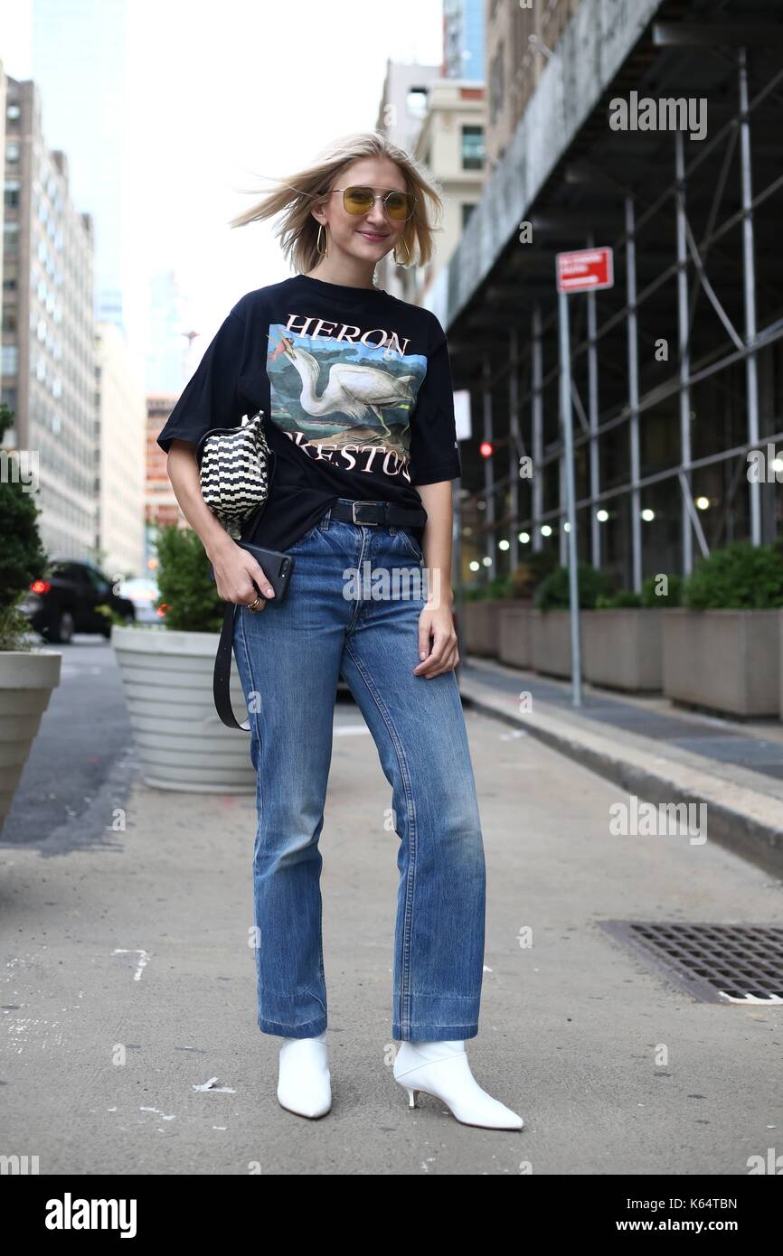 A chic showgoer posing outside of the Dion Lee runway show during New ...