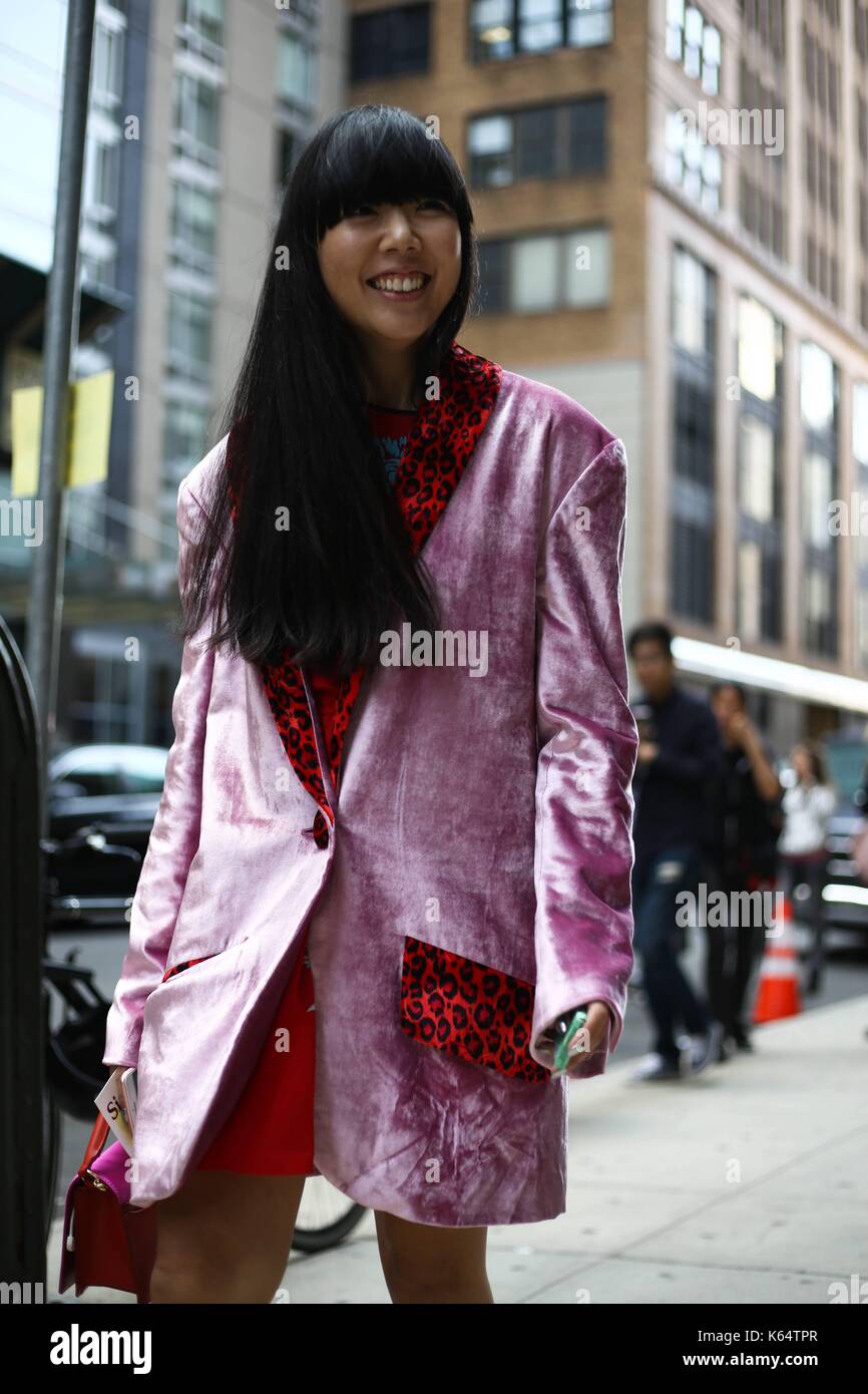 Blogger Susie Lau posing outside of the Sies Marjan runway show during ...