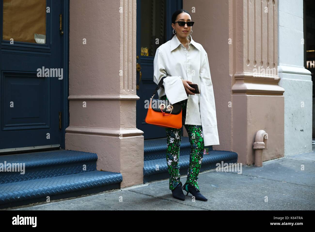 Sarah Brody, Fashion Market Editor at Teen Vogue, posing outside of the ...