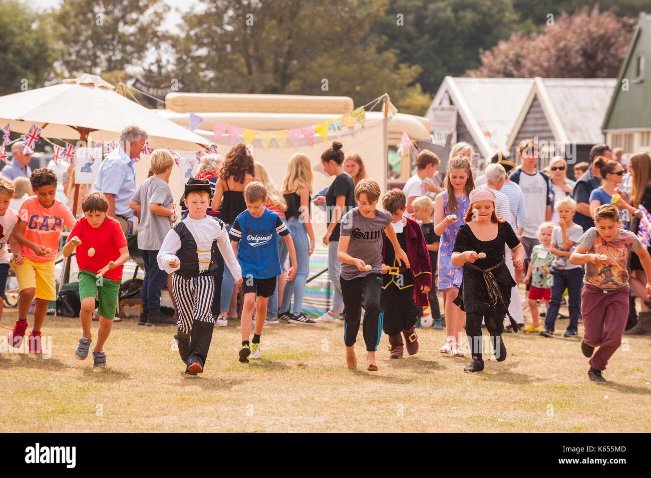 Egg and spoon race hi-res stock photography and images - Alamy