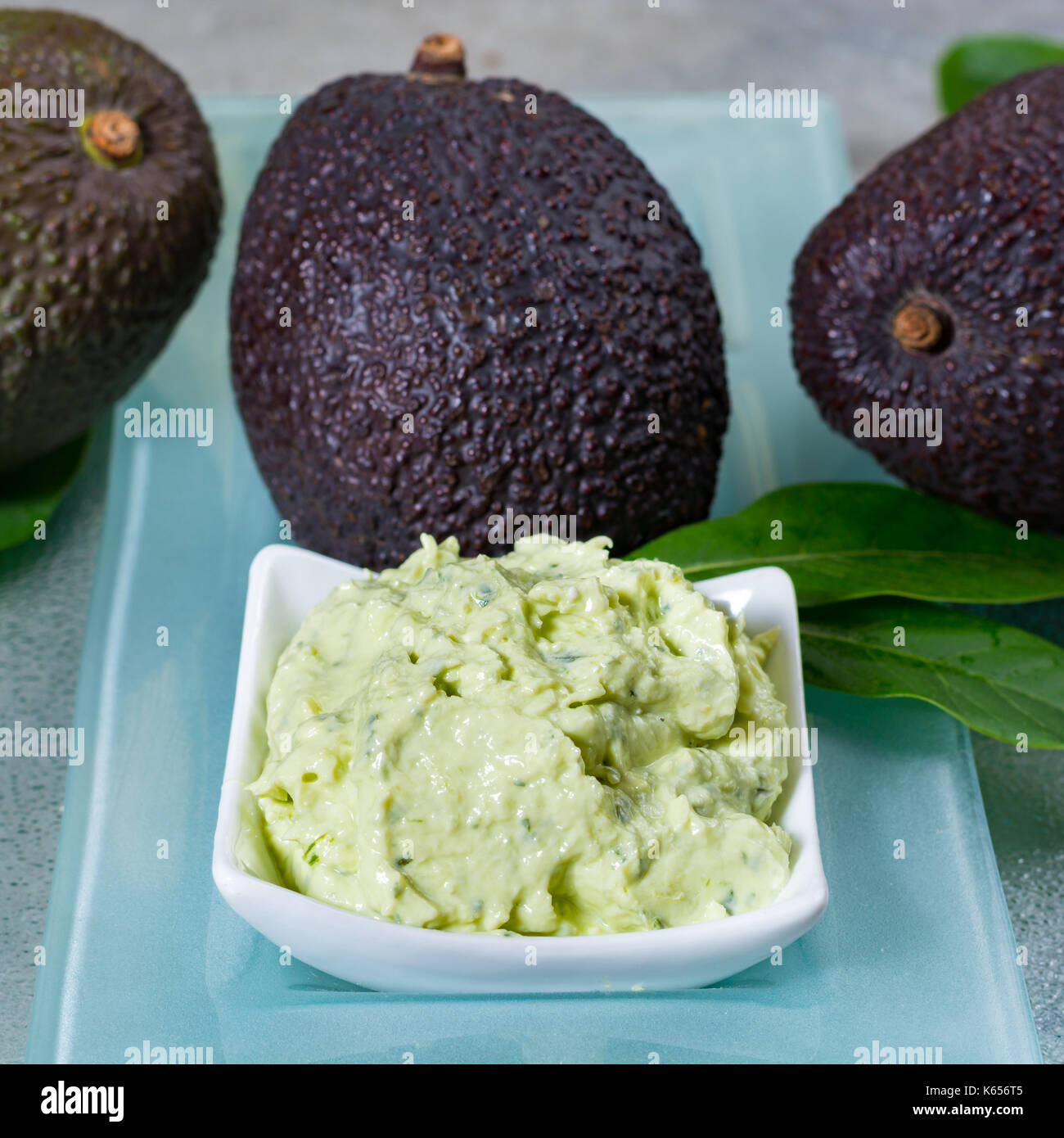 Avocado skin & hair care home spa, ripe avocados and bowl with homemade ...