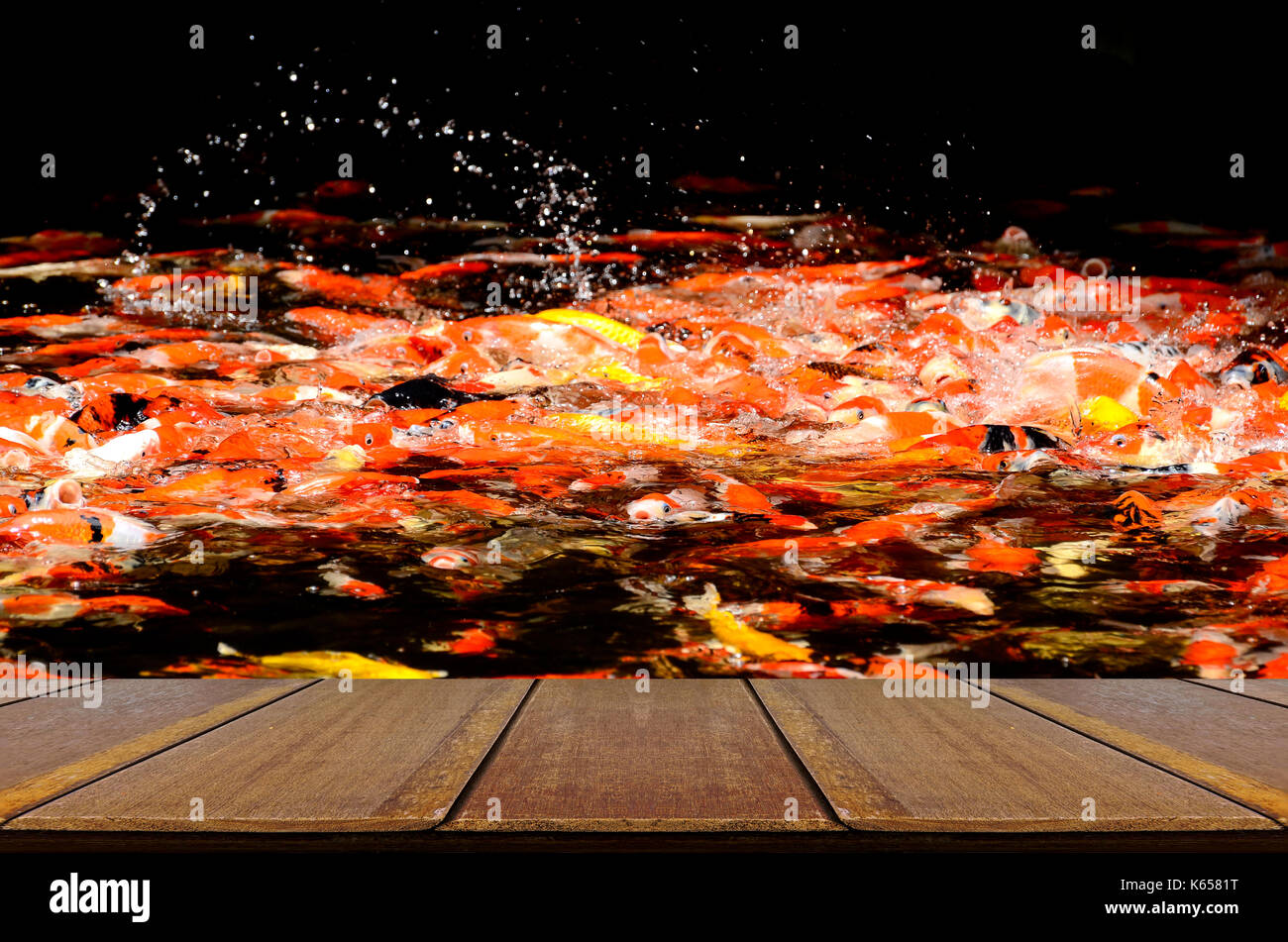 Perspective wood view with Backyard Koi fish pond background Stock ...