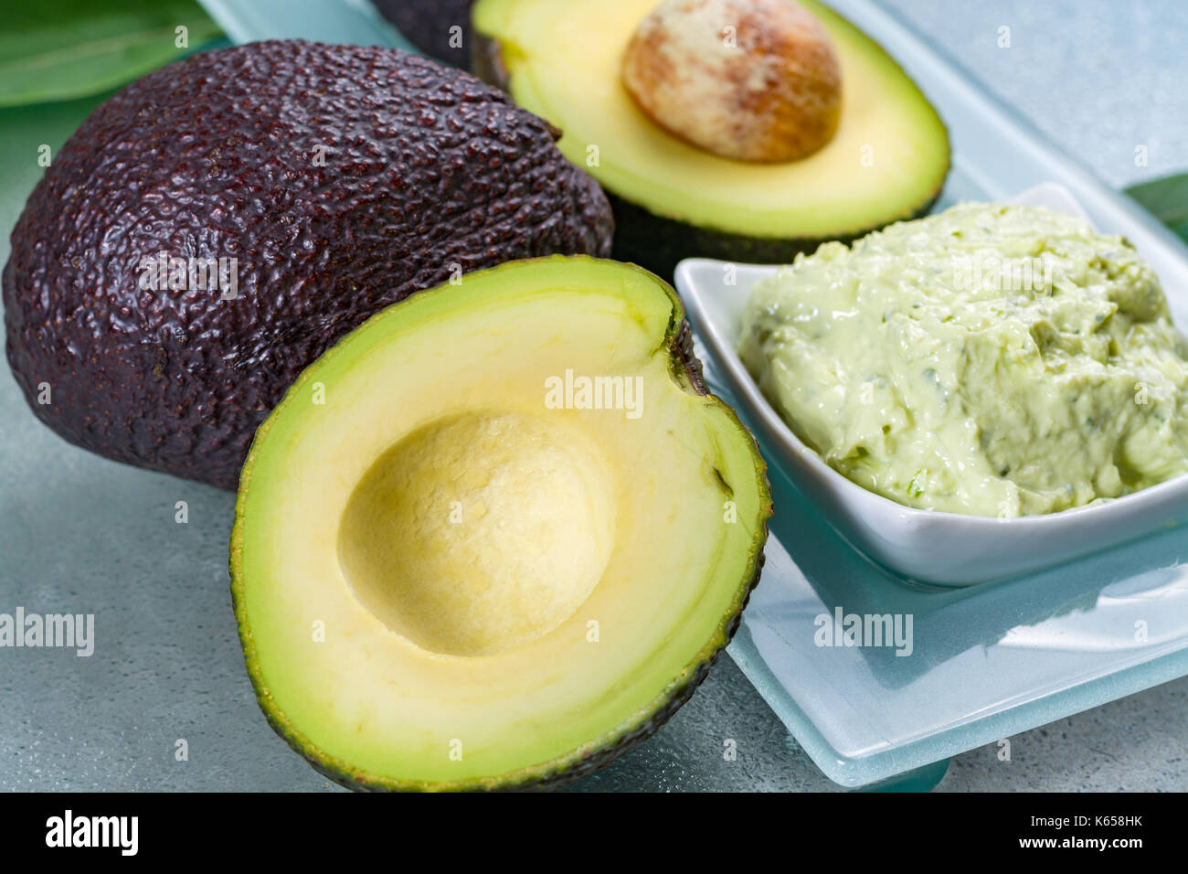 Avocado skin & hair care home spa, ripe avocados and bowl with homemade ...