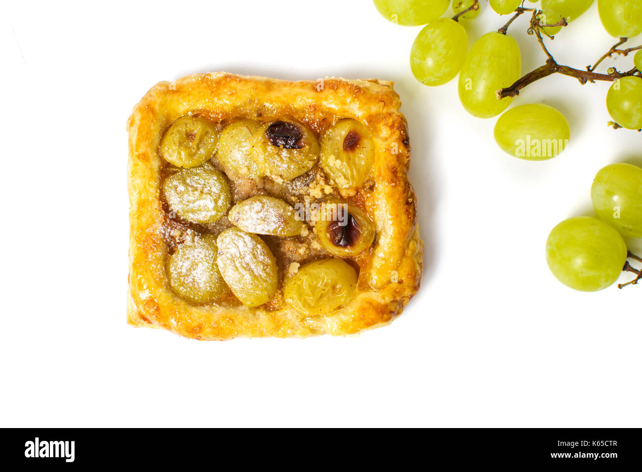 Homemade grape fruit pie slice on white background Stock Photo - Alamy