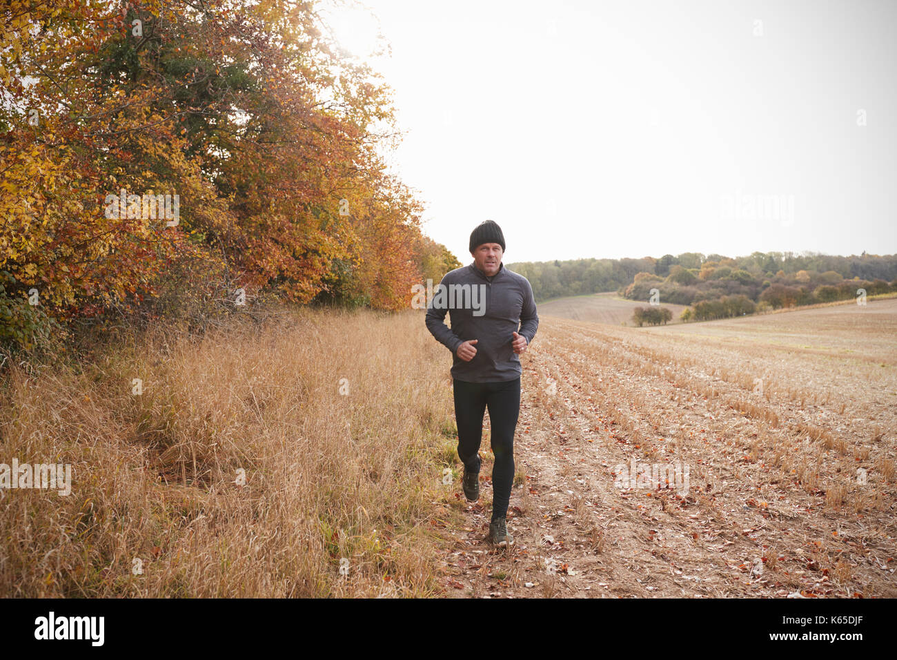 Middle aged man running hi-res stock photography and images - Alamy