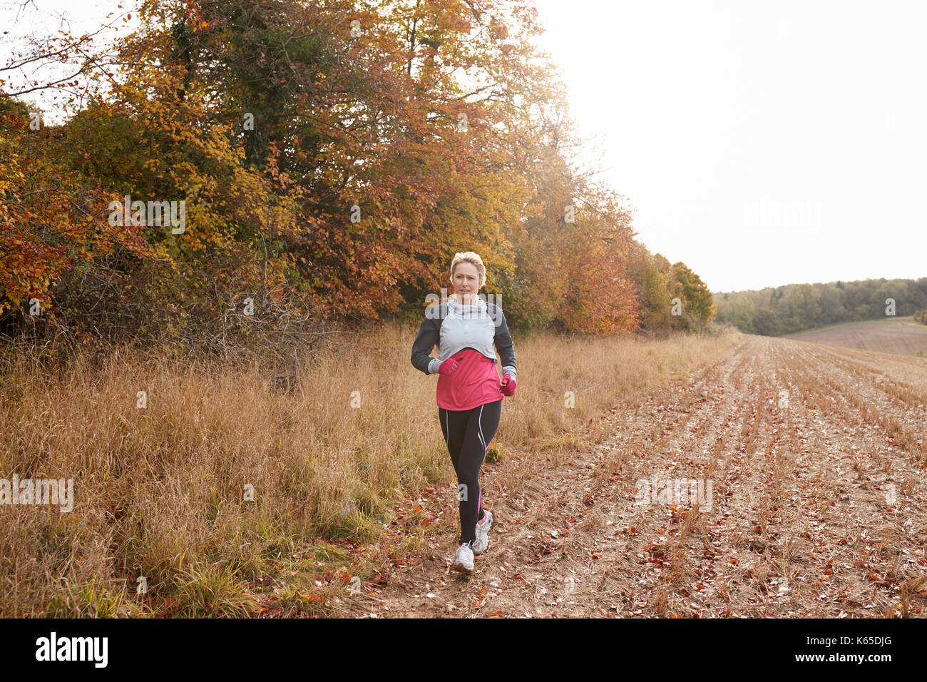 Female running gloves hi-res stock photography and images - Alamy