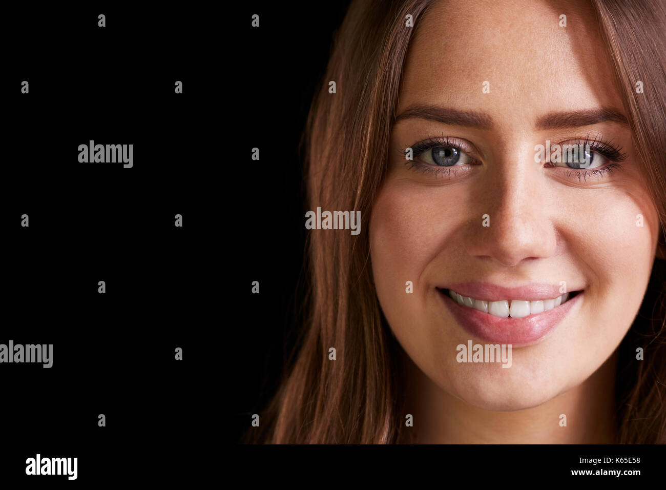 Close Up Head And Shoulders Studio Portrait Of Smiling Woman Stock ...