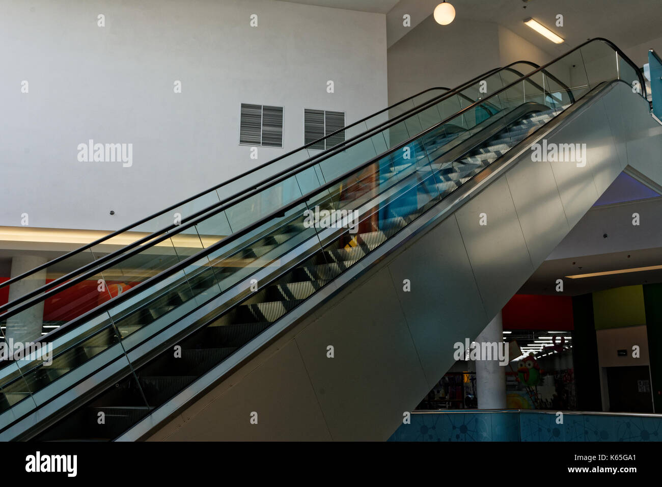 Escalator in shopping center hi-res stock photography and images - Alamy