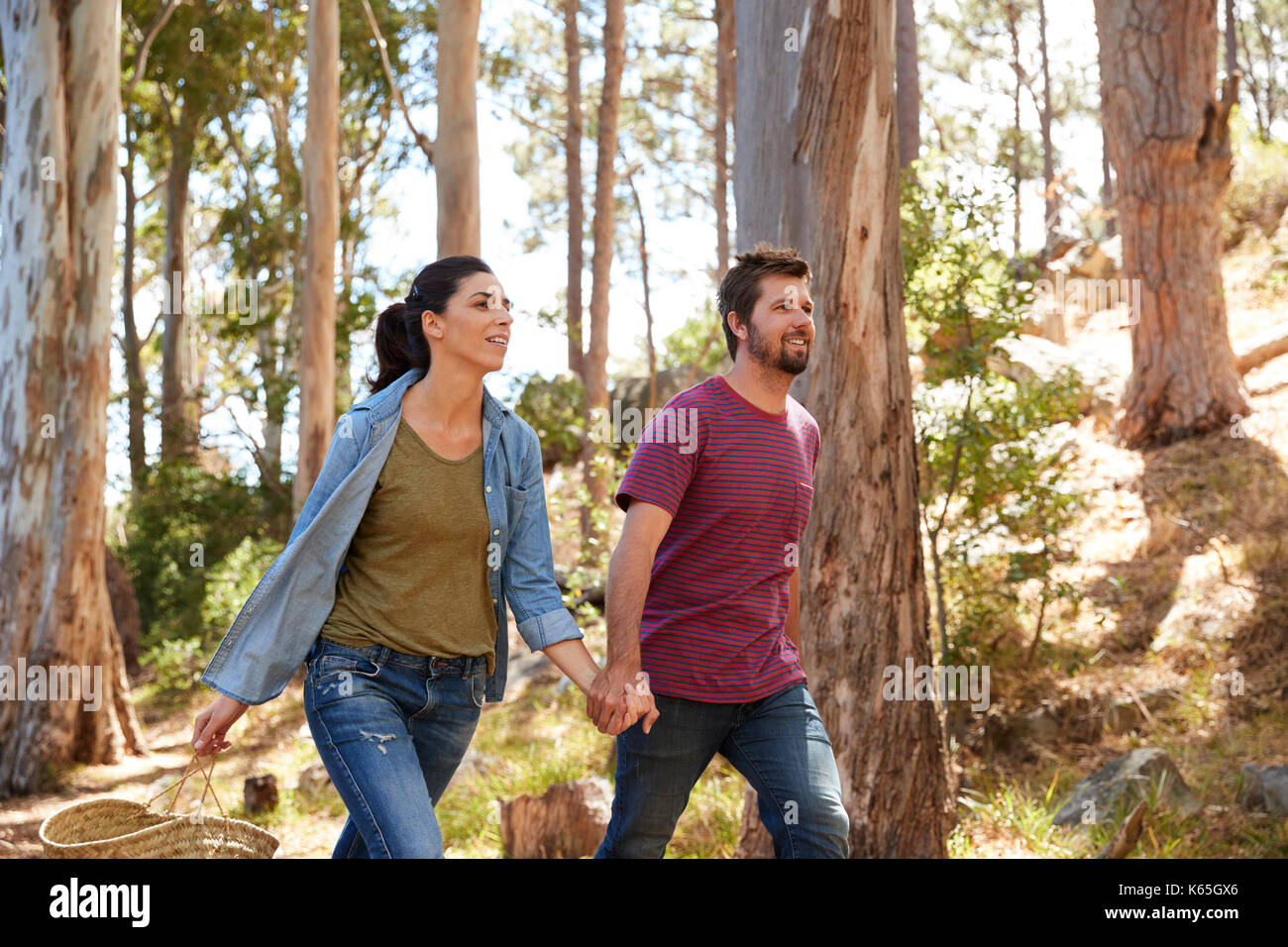 Person walking along peaceful forest hi-res stock photography and ...