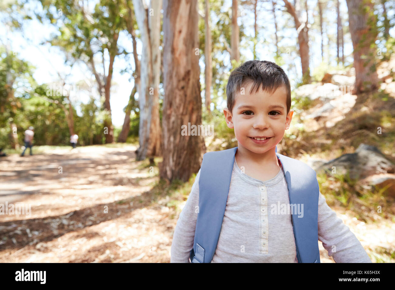 Portrait Of Boy Wearing Backpack On Countryside Walk Stock Photo - Alamy