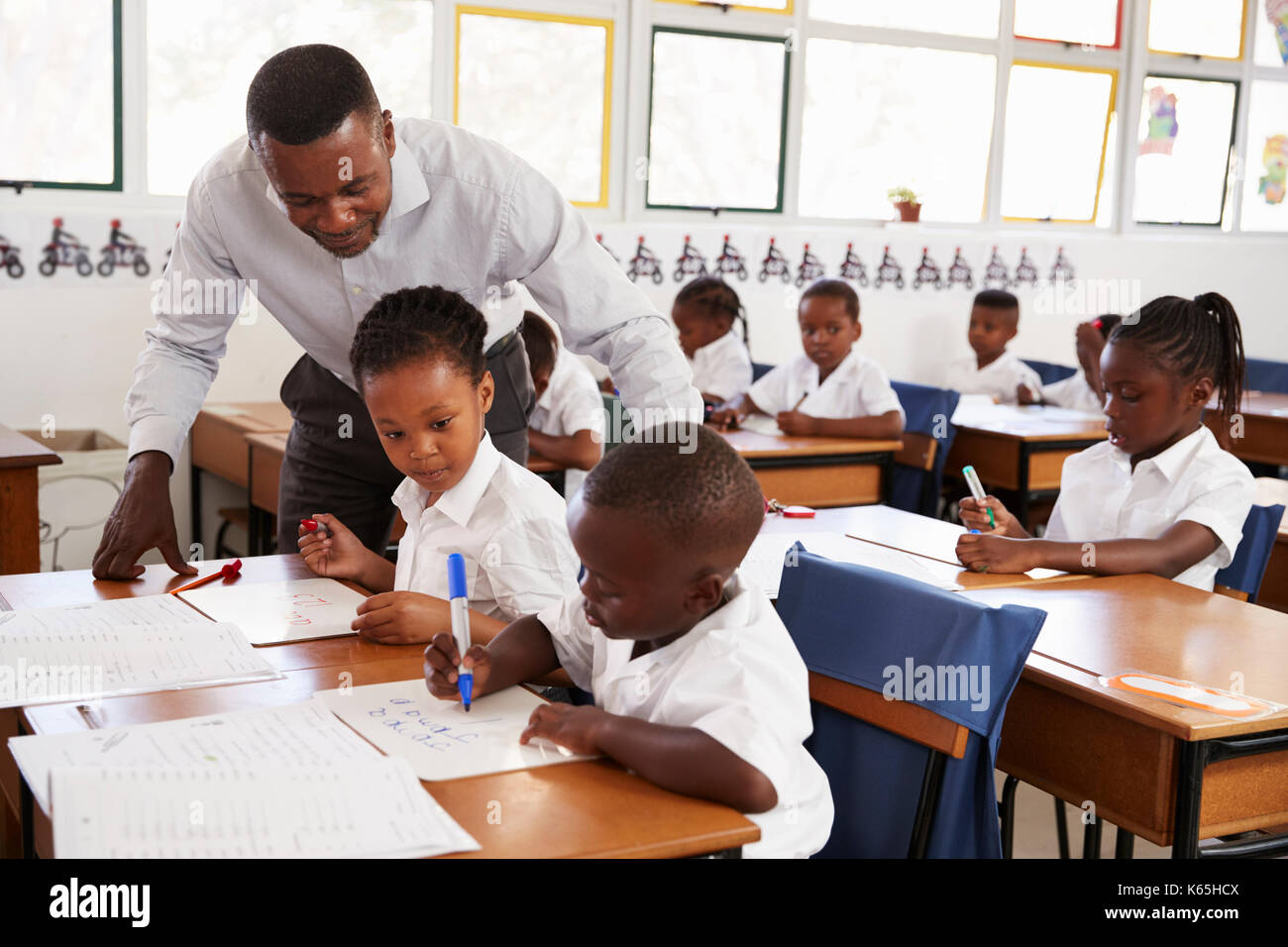 Kids Helping Each Other School High Resolution Stock Photography and ...