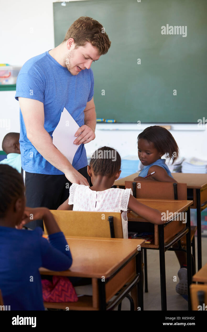 Classmates helping each other hi-res stock photography and images - Alamy