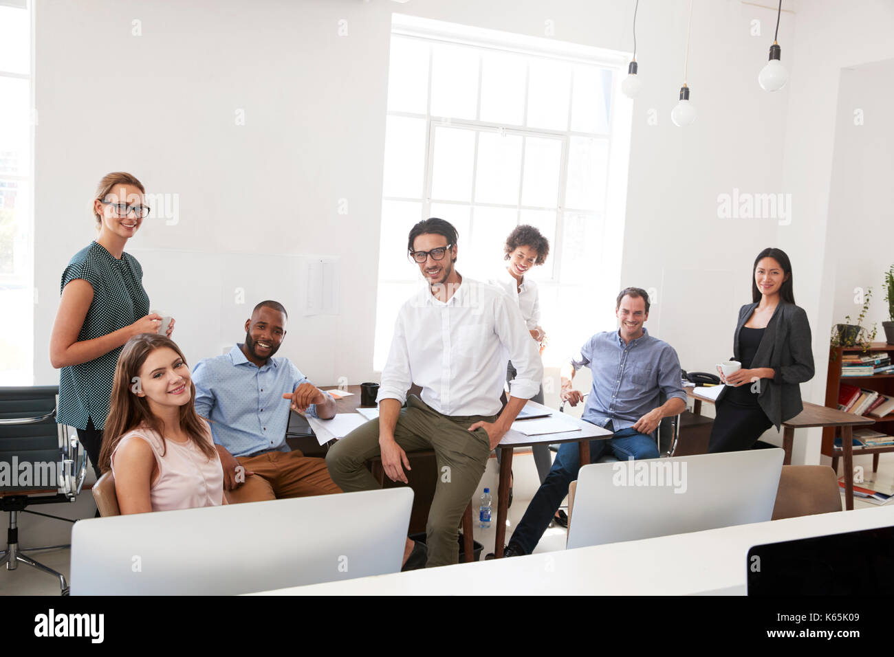 Happy relaxed office workers in hi-res stock photography and images - Alamy
