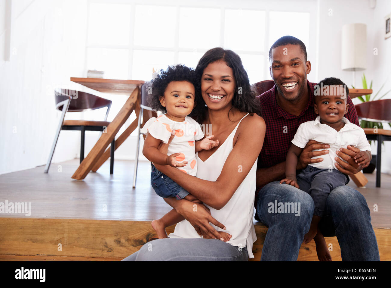 Portrait Of Family With Young Children At Home Together Stock Photo - Alamy