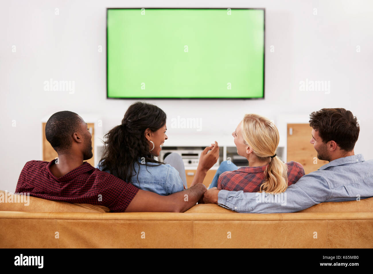 Group people watching tv rear hi-res stock photography and images - Alamy