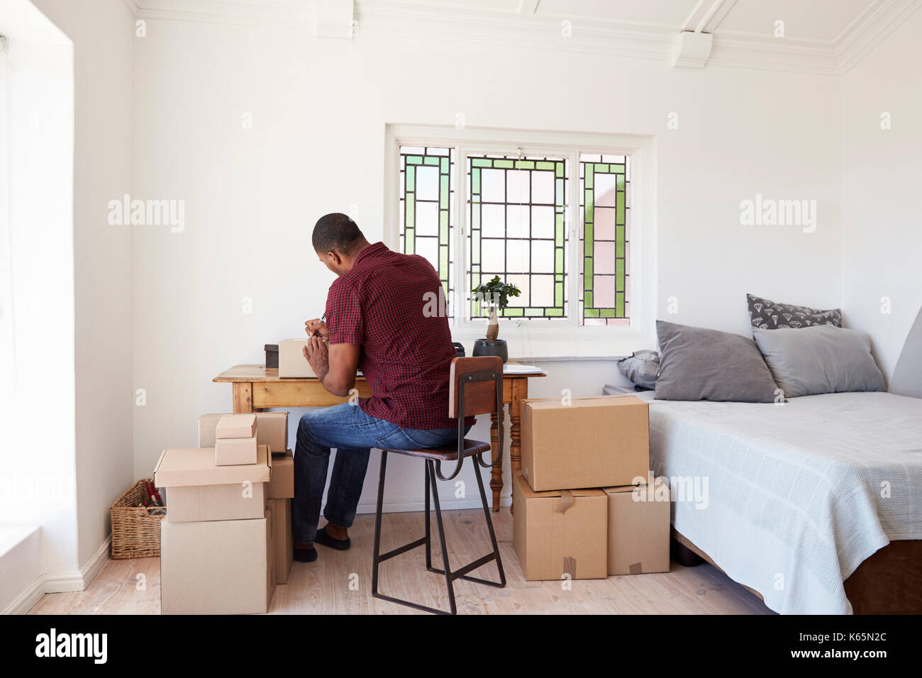 Business man running from behind hi-res stock photography and images ...