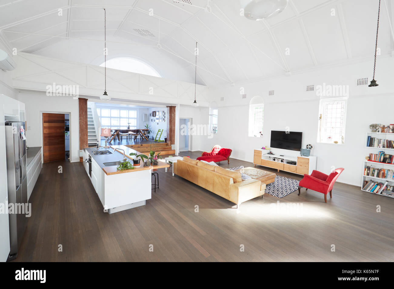 Home Interior With Open Plan Lounge And Dining Area Stock Photo - Alamy