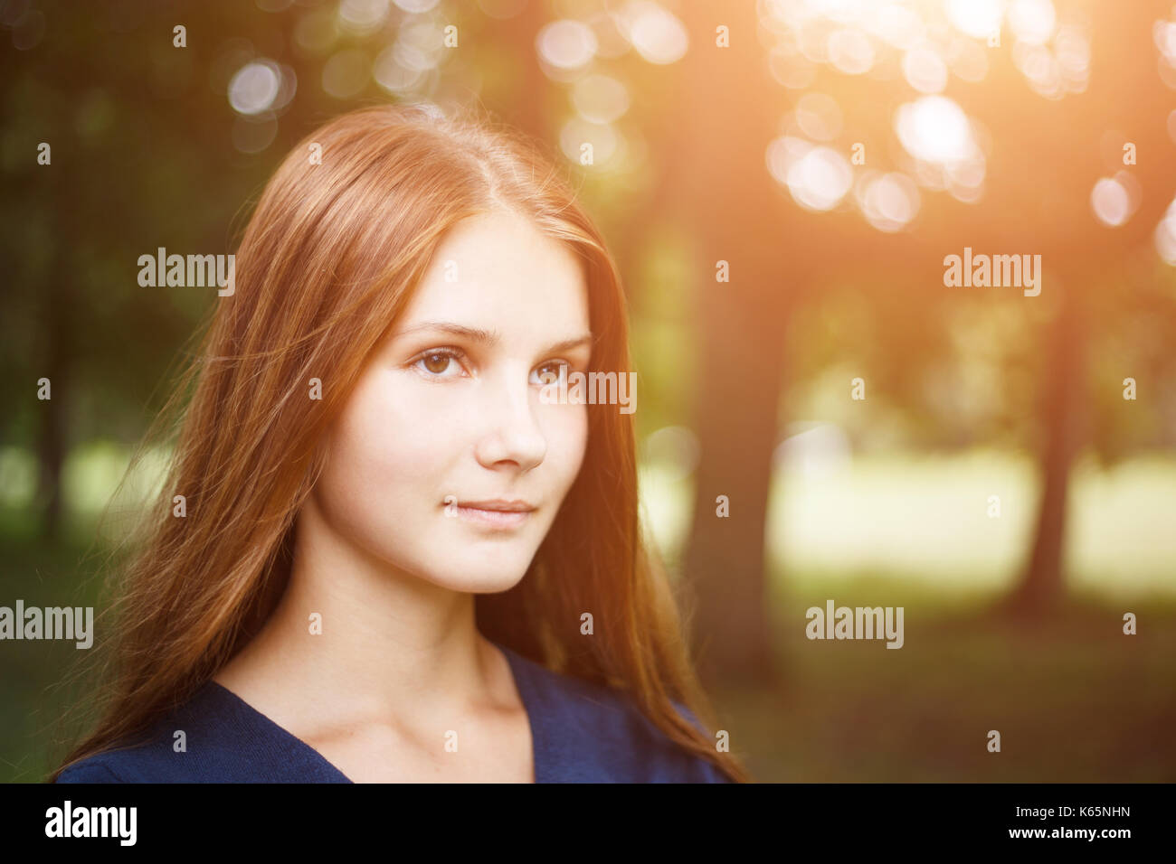 Close up portrait of young beautiful girl with long brown hair Stock ...