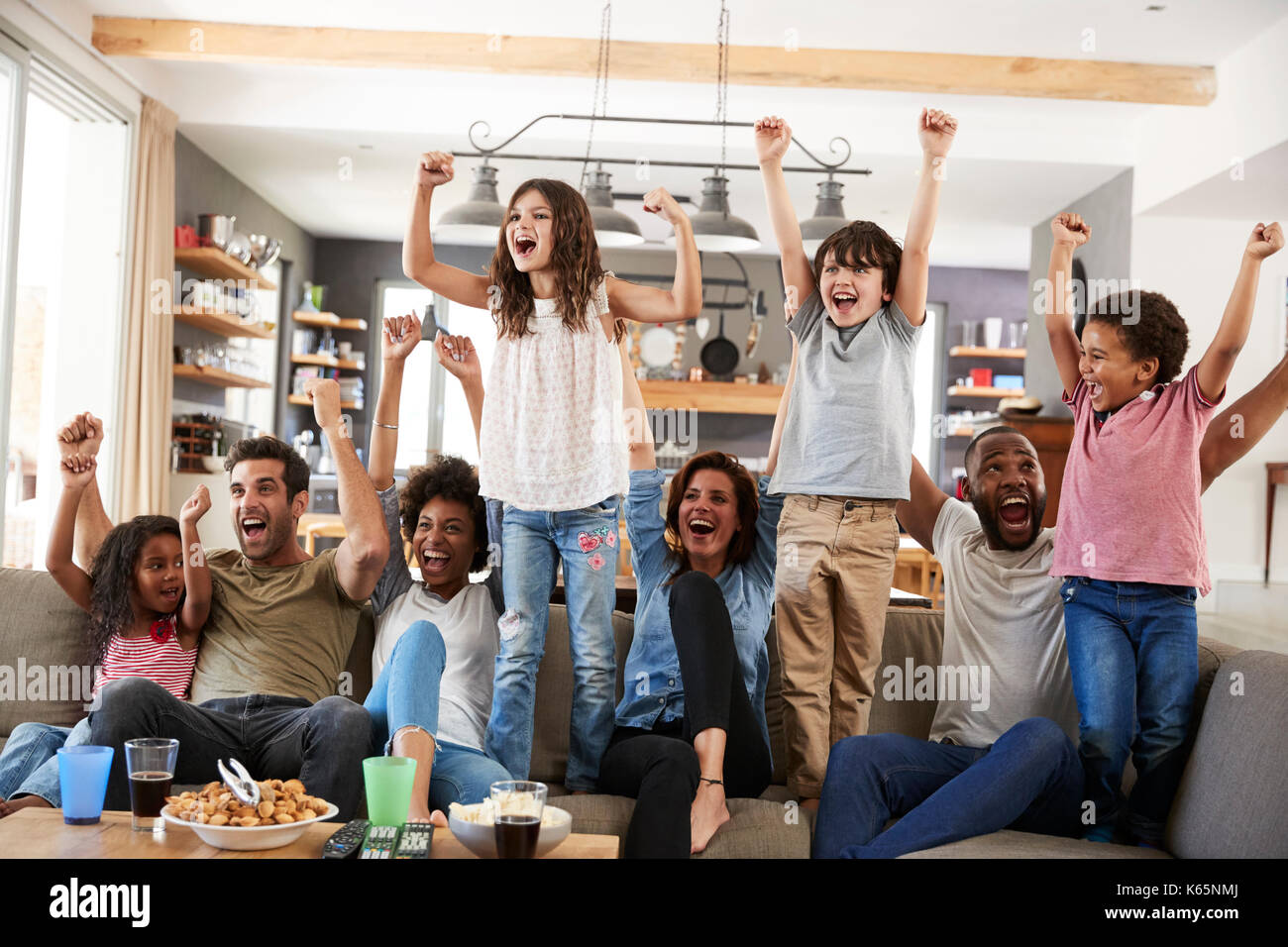 Children cheering on their father hi-res stock photography and images ...