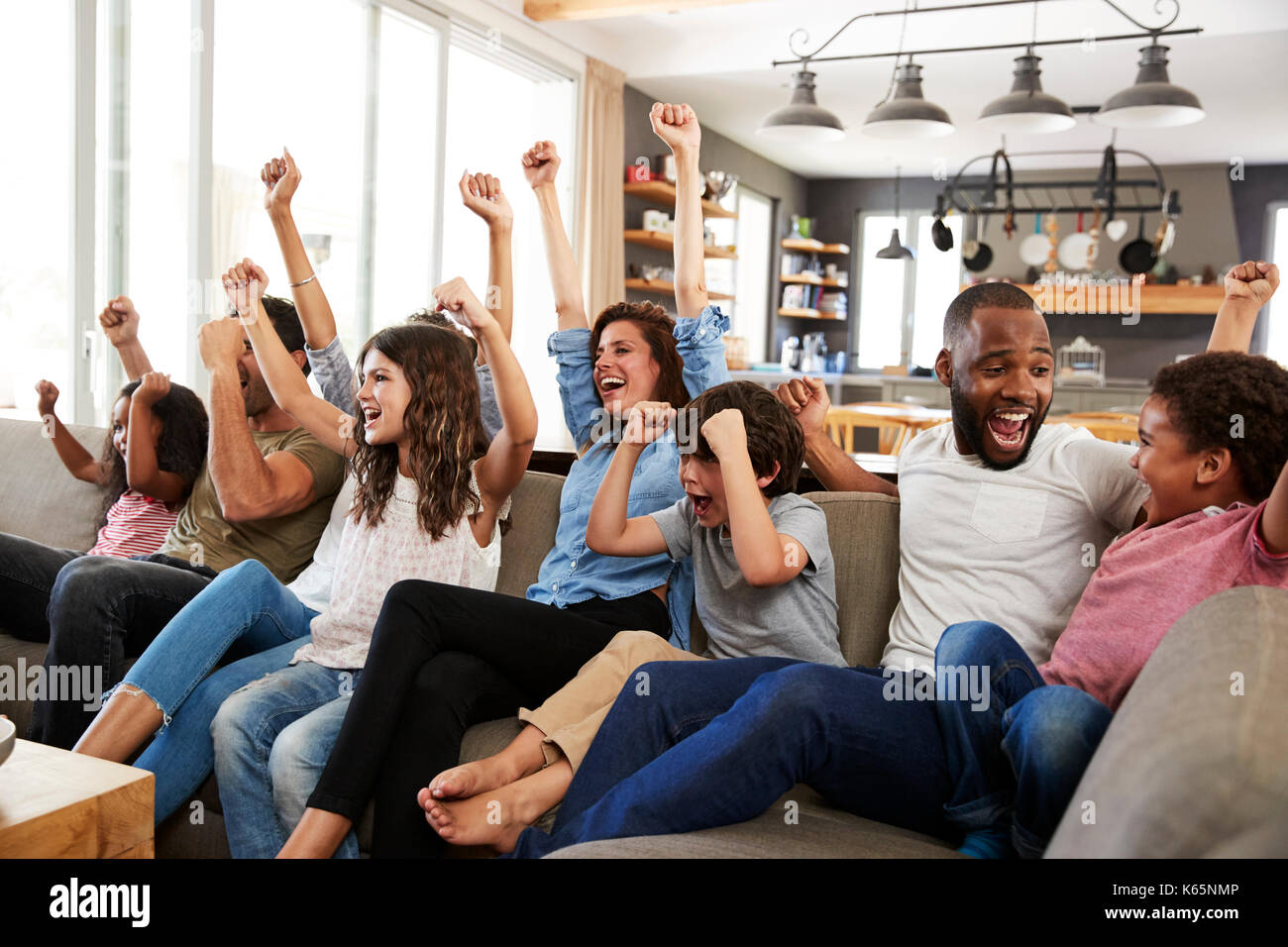 Children cheering on their father hi-res stock photography and images ...