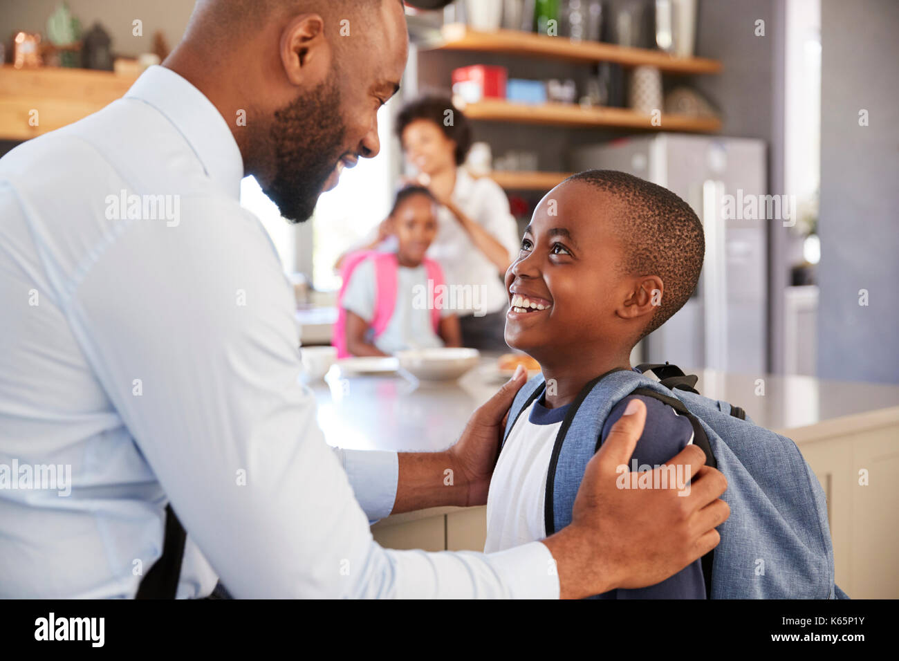 Father Saying Goodbye To Son As He Leaves For School Stock Photo - Alamy