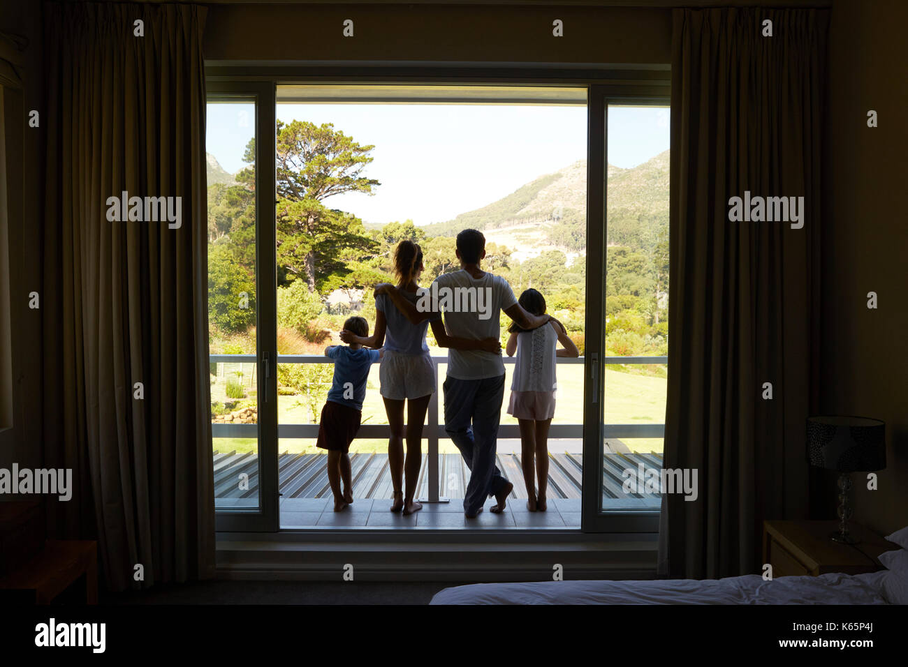 Old woman looking from balcony hi-res stock photography and images - Alamy