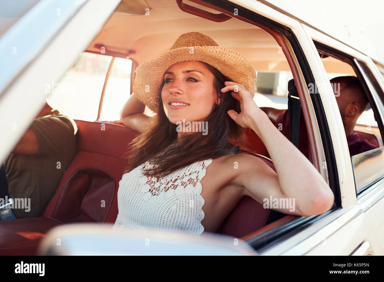 Group Of Friends Relaxing In Car During Road Trip Stock Photo - Alamy