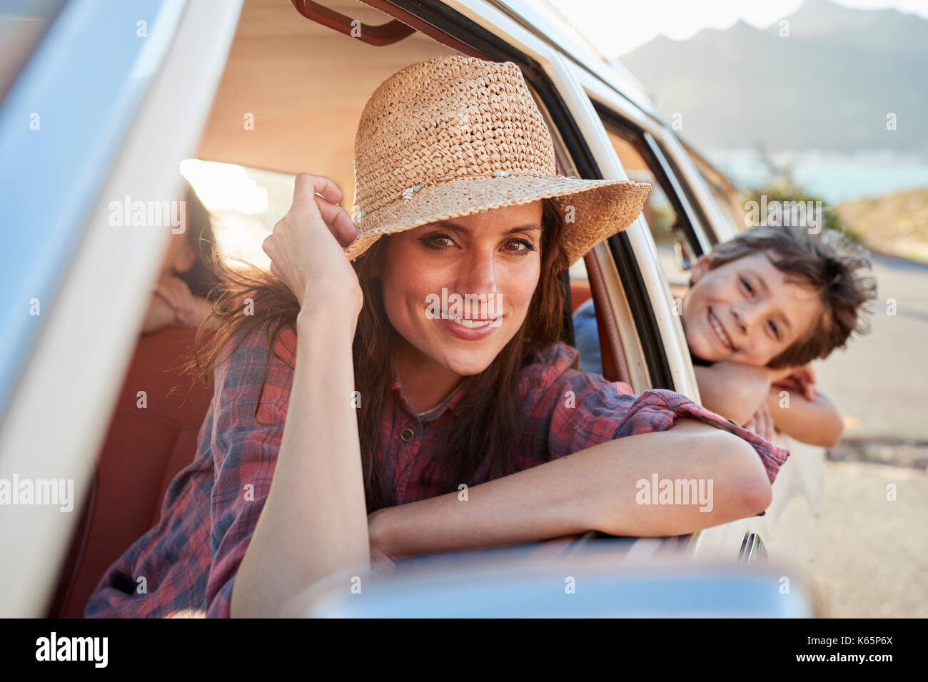 Portrait Of Mother And Children Relaxing In Car During Road Trip Stock ...