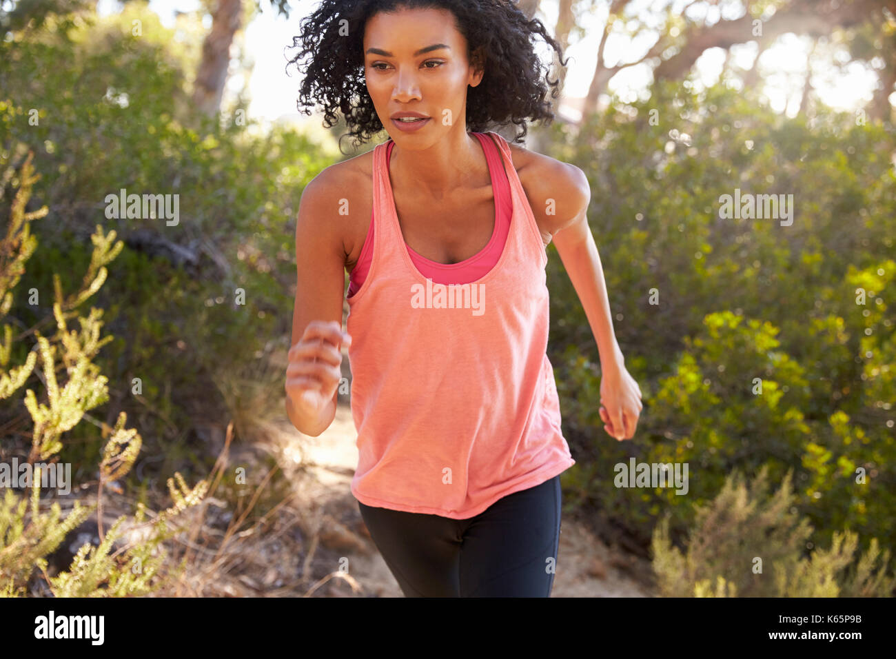 Woman running close up shoulder hi-res stock photography and images - Alamy