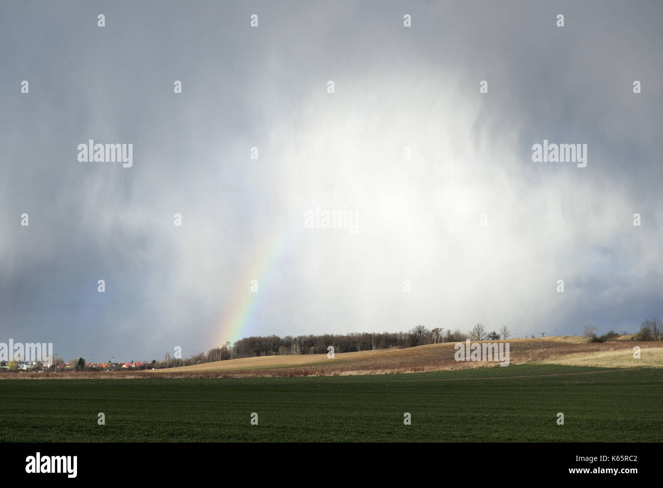 heavy rain and dangerous lightning, rainbow Stock Photo - Alamy
