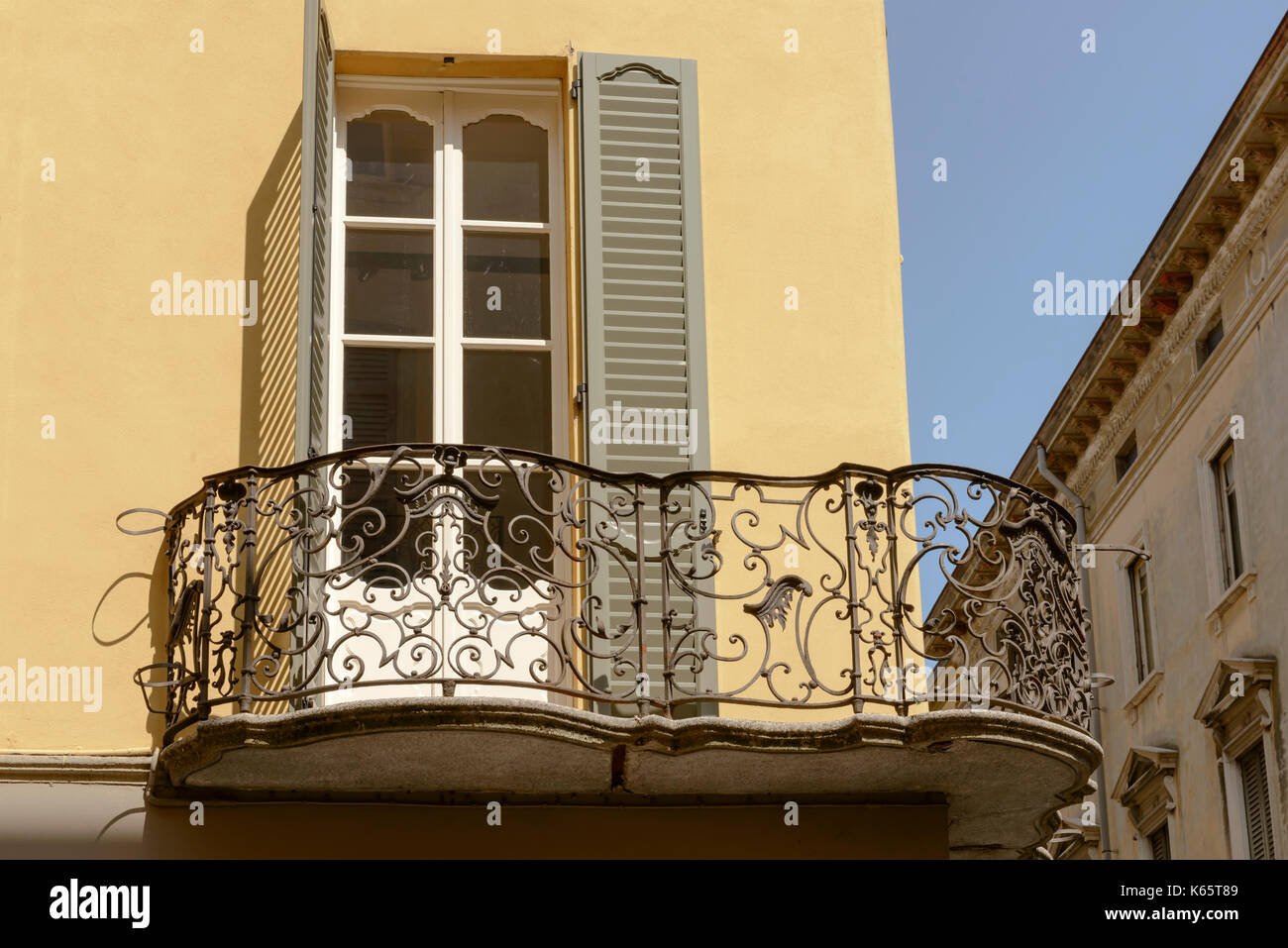 ancient decorated wrought iron railing on balcony of old traditional ...