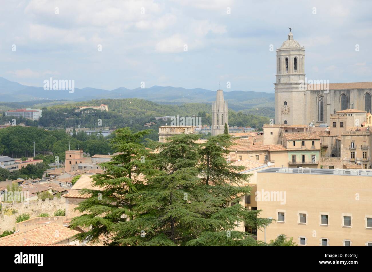 View of the cathedral among buildings seen from the walls of Girona, Catalonia, northeastern ...